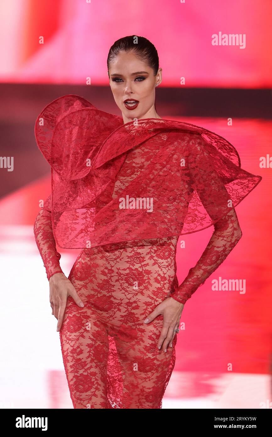 Coco Rocha wears a creation for the L'Oreal Spring/Summer 2024 womenswear fashion collection ...