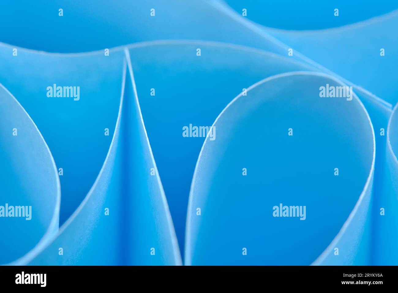 Abstract, blue paper background with smooth lines Stock Photo - Alamy