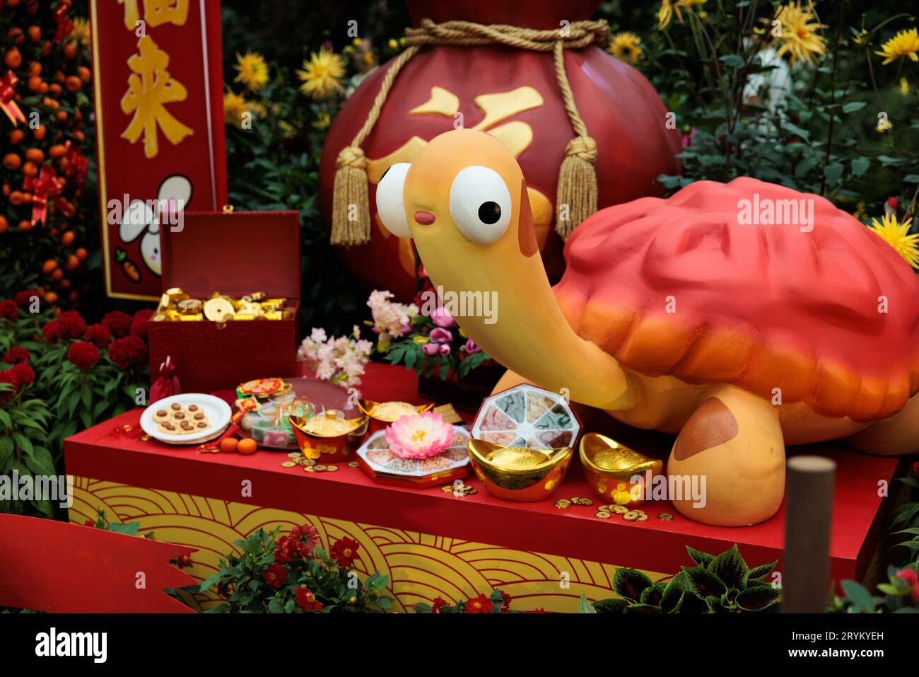 Cute and adorable cartoon-like rabbit and turtle emerging from flowers ...