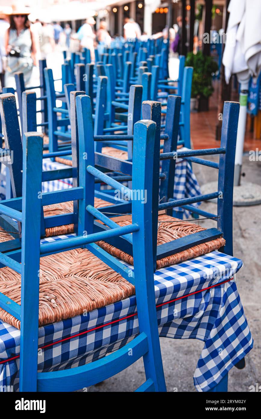 Typical greek blue tables and chairs in a restaurant Stock Photo - Alamy