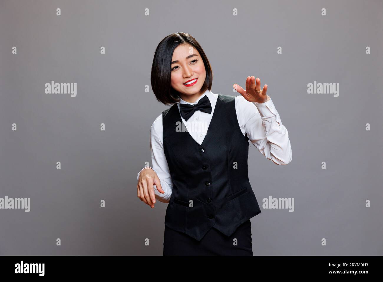 Catering service cheerful smiling asian woman employee dancing ...