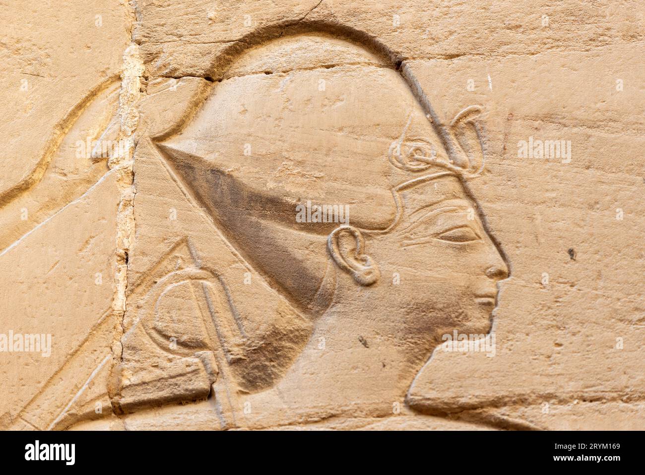 Ancient carved egyptian symbols and hieroglyphs on walls of Karnak ...