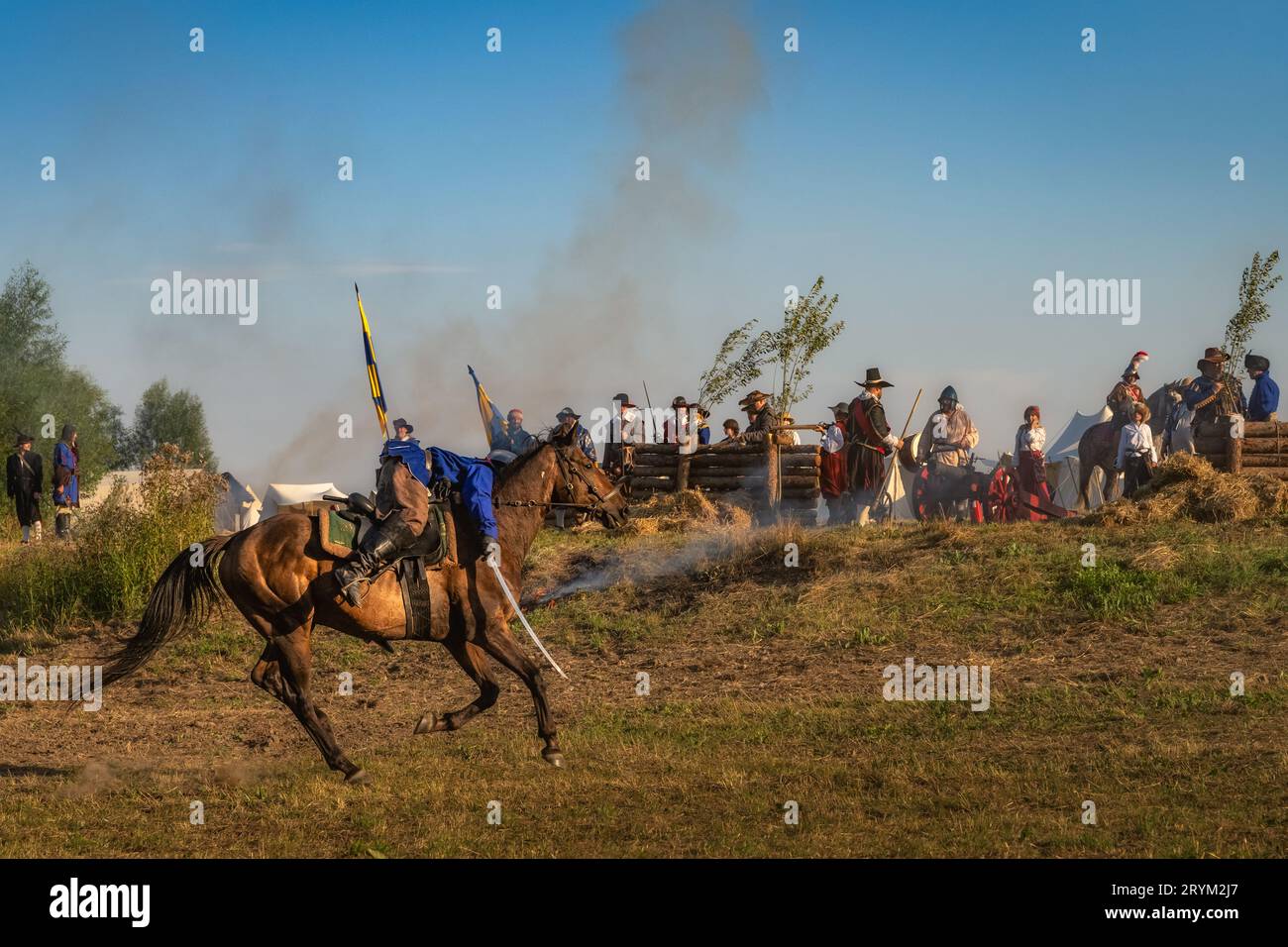 Wounded soldier escaping on a horse on a battlefield. Historical ...