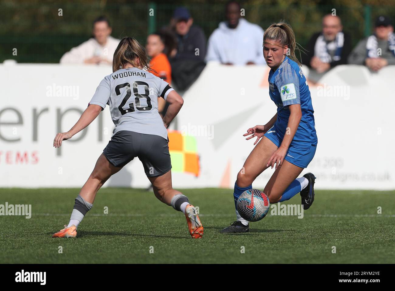 Durham Women's Poppy Pritchard in action with Reading's Lily Woodham ...