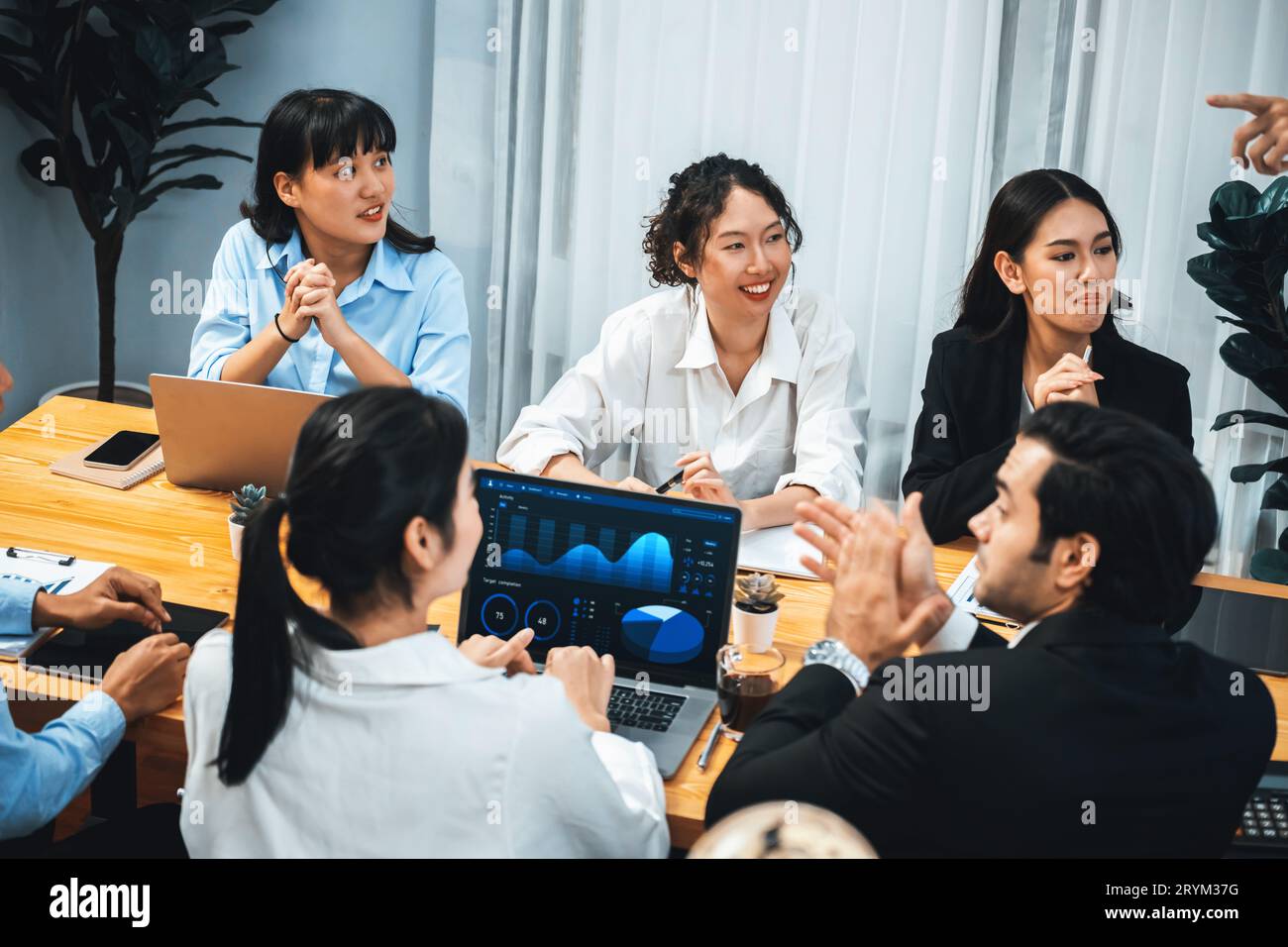 Diverse group of business analyst team analyzing financial data report ...