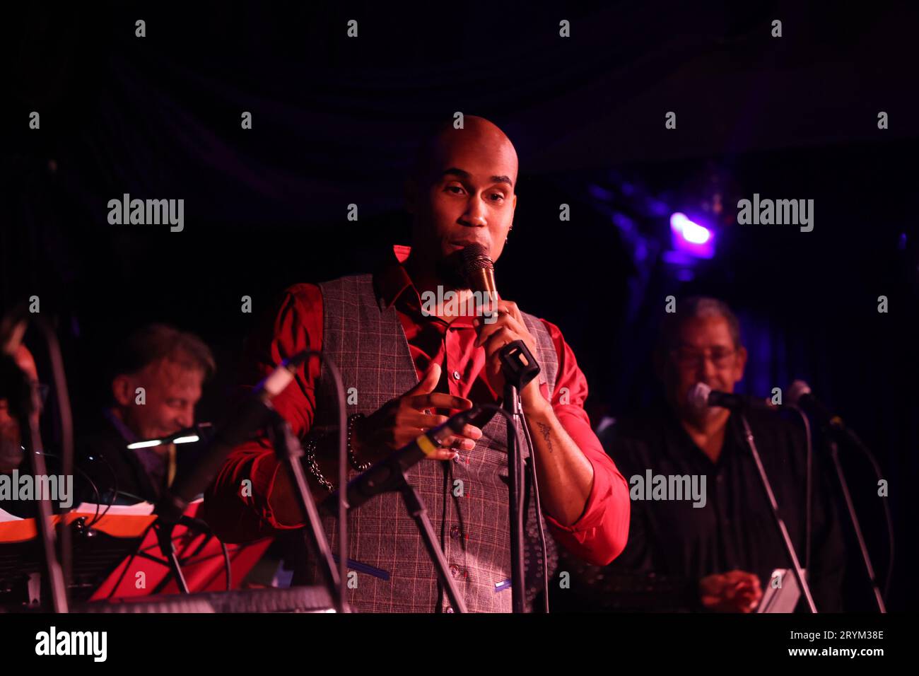 Band continues under hi-res stock photography and images - Alamy