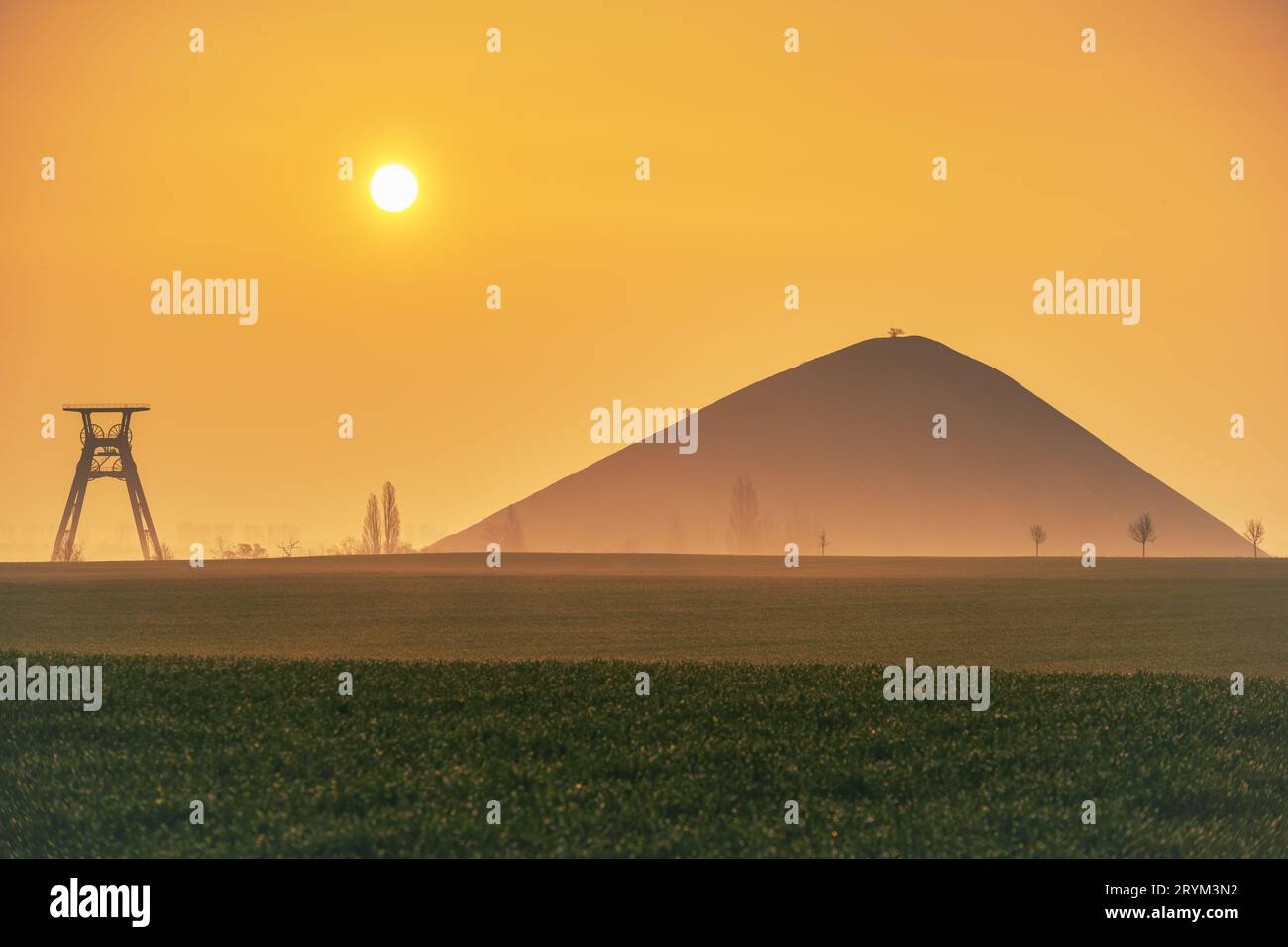 Sunrise at the winding tower for the copper mine near Nienstedt Stock ...