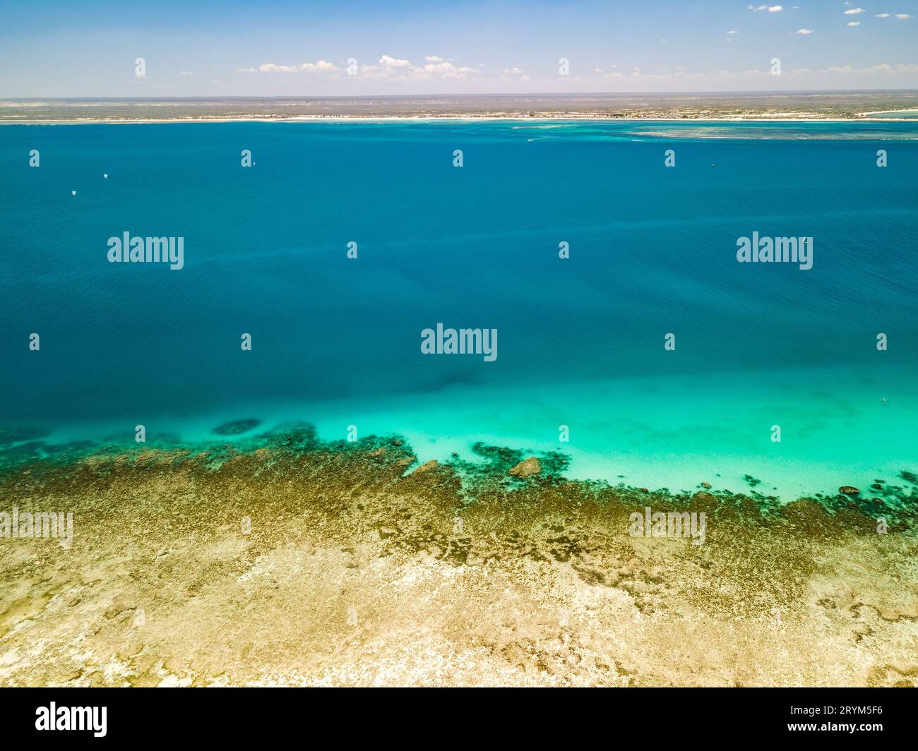 Bird's eye view of the turquoise waters surrounding the island of Nosy ...