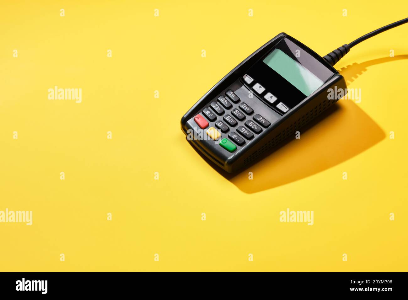 POS payment terminal on yellow background. Minimal financial service ...
