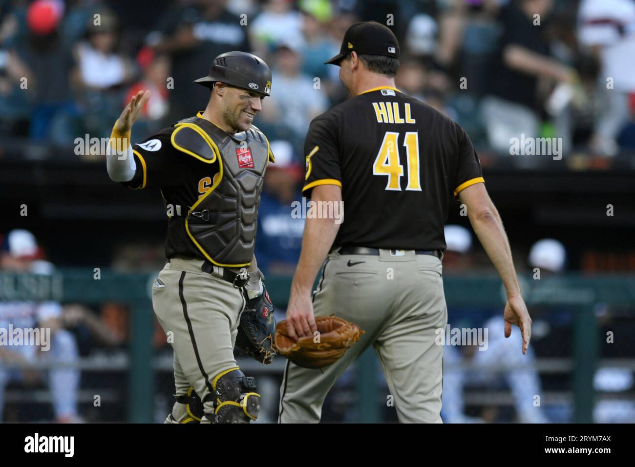 San Diego Padres closing pitcher Rich Hill (41) celebrates with catcher ...