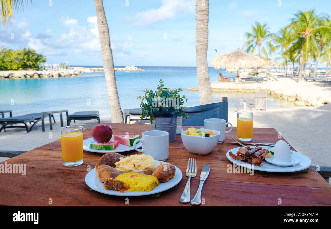 Breakfast on the beach of Curacao Caribbean Island Stock Photo - Alamy