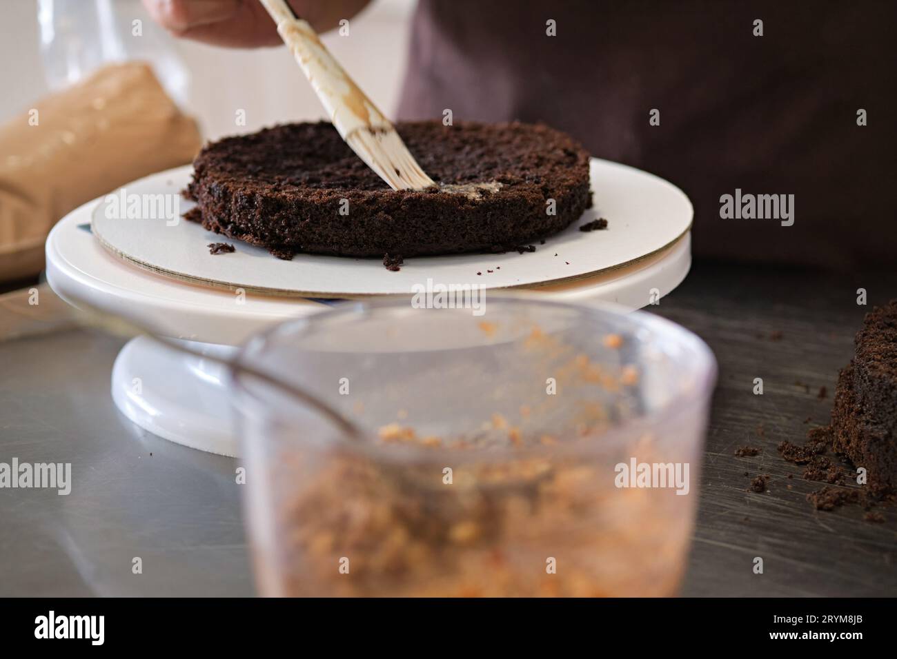 Woman pouring cream on sponge hi-res stock photography and images - Alamy