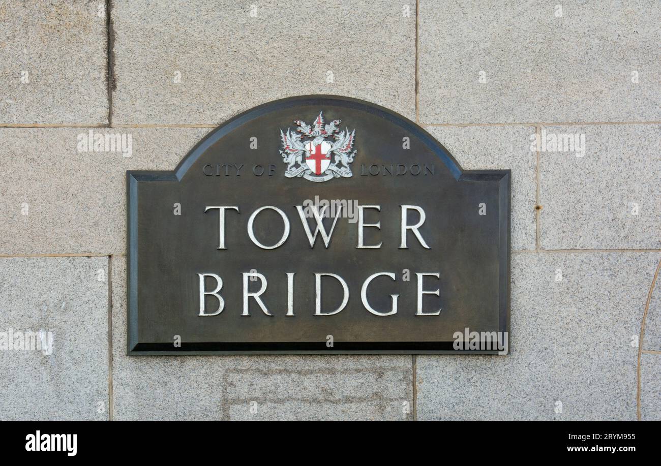 Tower Bridge sign on the wall. The Tower Bridge is a suspension bridge ...