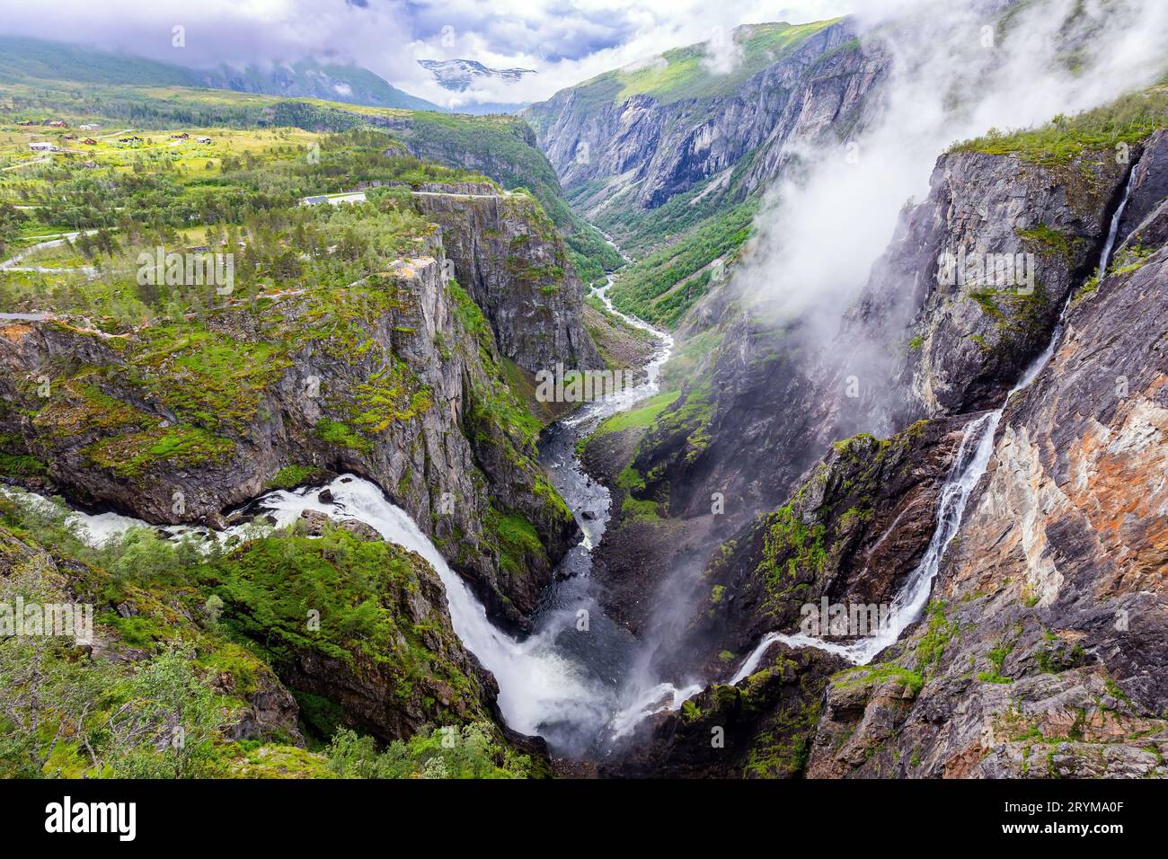 The waterfall falls into a narrow gorge Stock Photo - Alamy