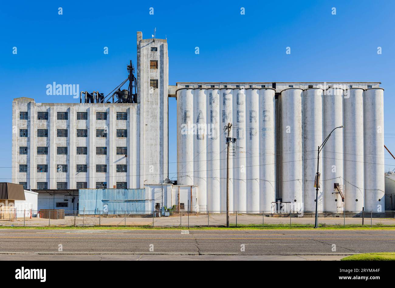 Oklahoma, SEP 3 2023 - Sunny exterior view of the Yukon Mill and Grain ...