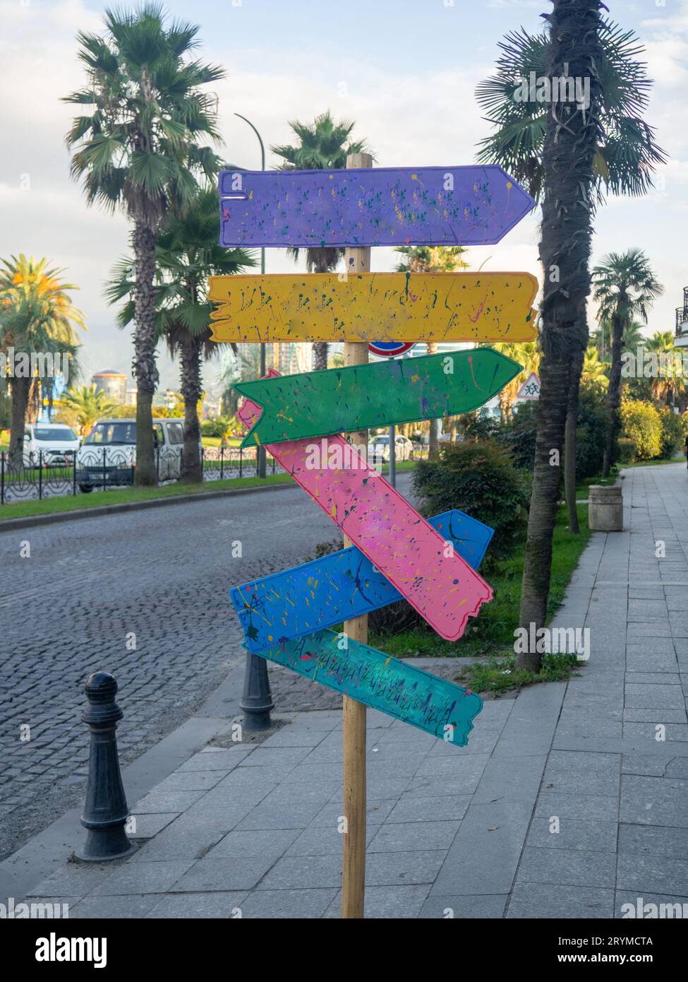 Multi-colored road signs. Path selection concept. Signpost in the old ...