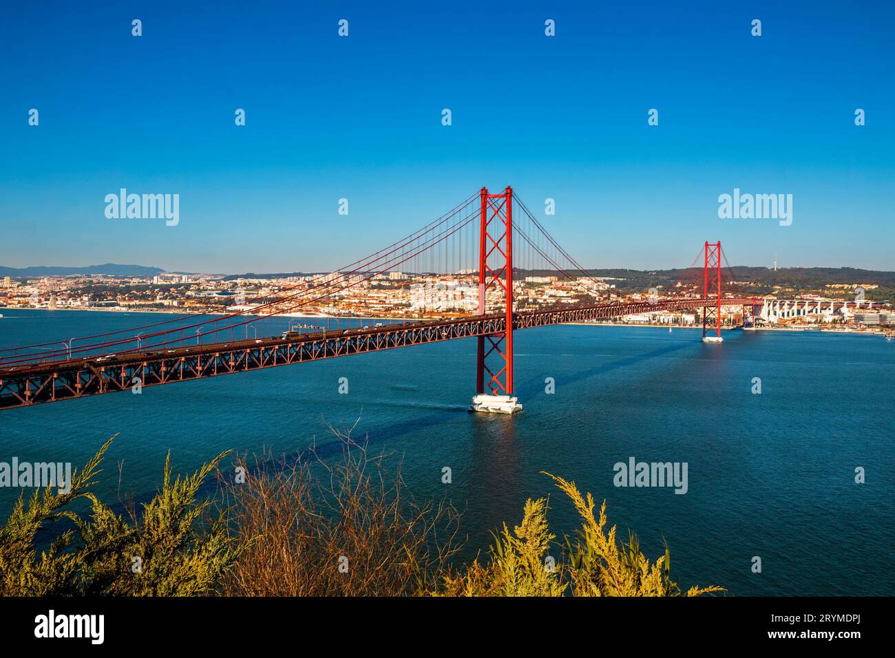 The 25th April Bridge (Ponte 25 de Abril) in Lisbon, Portugal. View ...