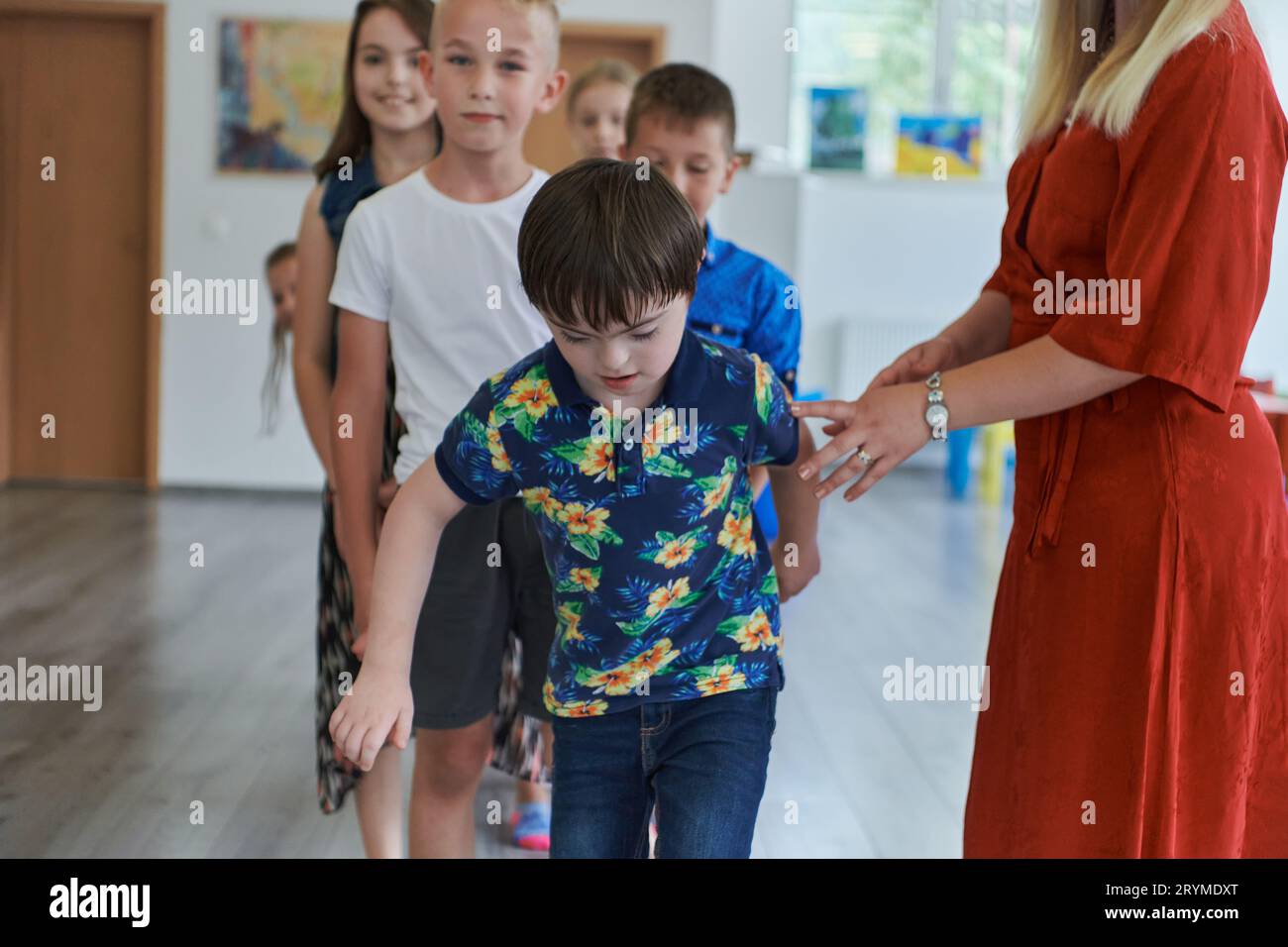 Group children disability playground hi-res stock photography and ...