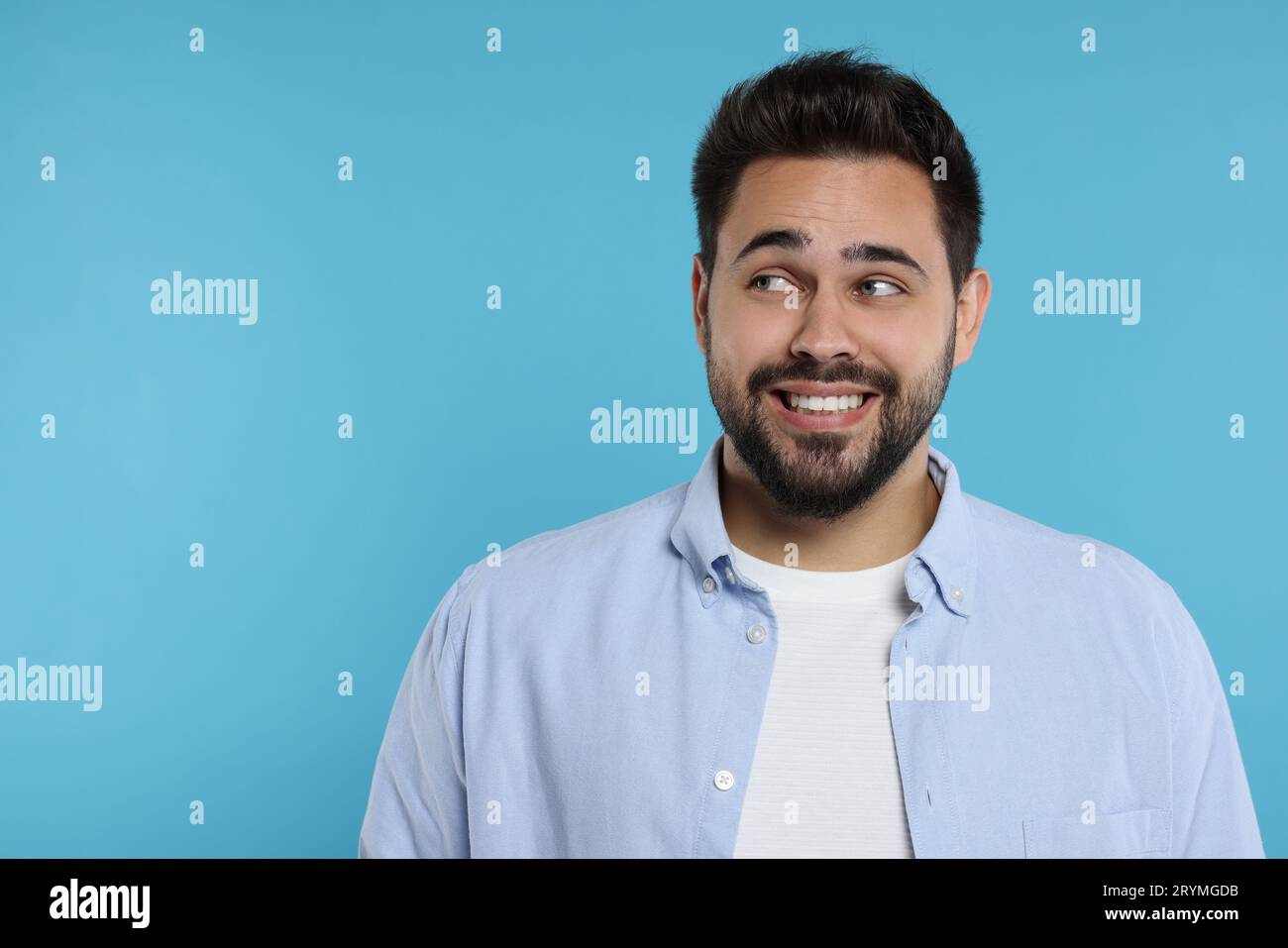 Embarrassed man on light hi-res stock photography and images - Alamy