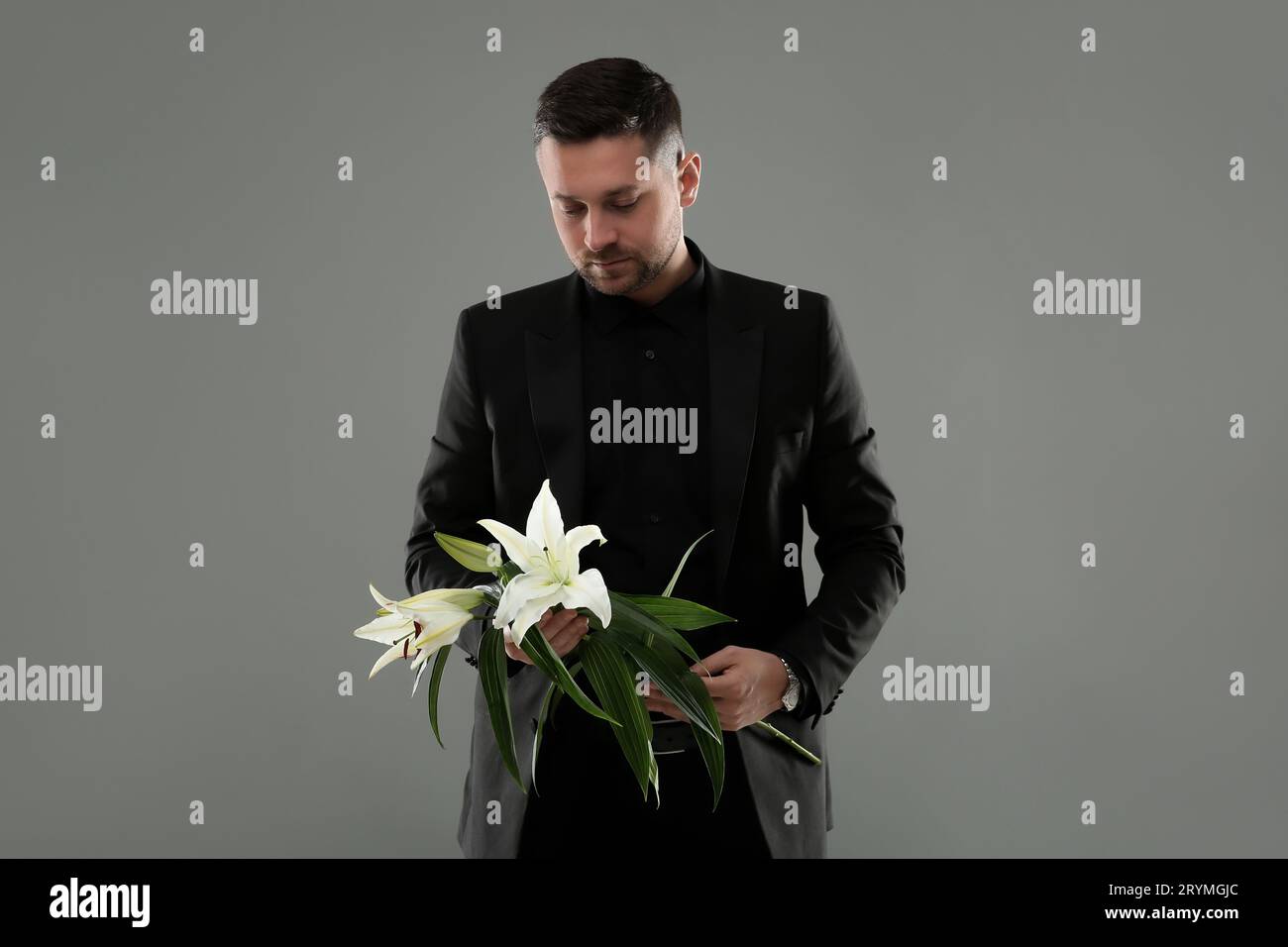 Young man sad funeral hi-res stock photography and images - Alamy