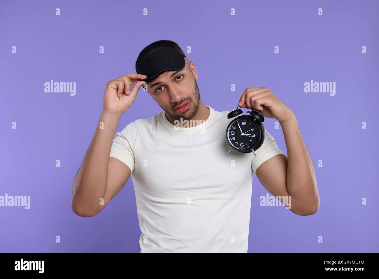 Man insomnia clock sleeping hi-res stock photography and images - Alamy