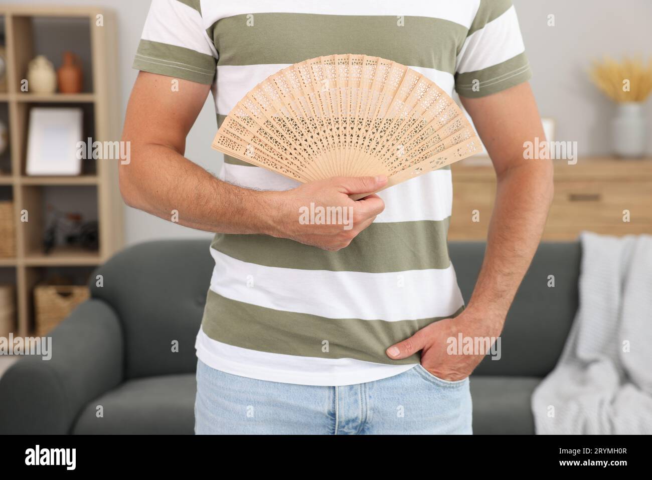 Hand holding portable fan hi-res stock photography and images - Alamy