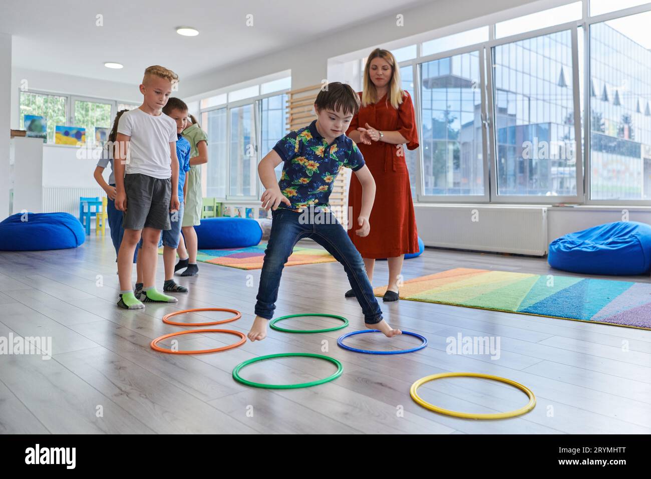 Group children disability playground hi-res stock photography and ...