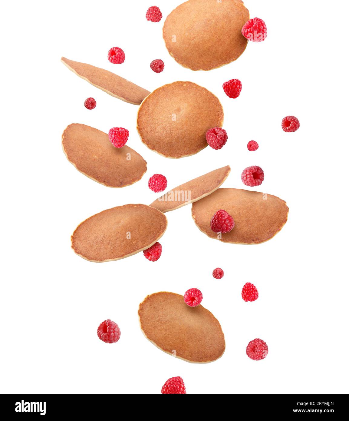 Many fresh pancakes and raspberries flying on white background Stock ...