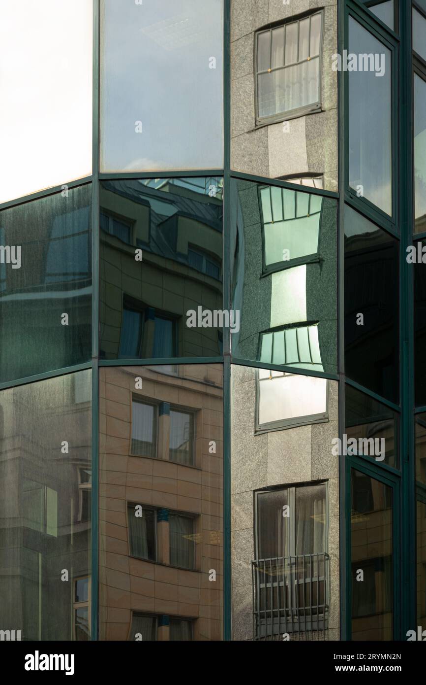 Old and Modern architecture concept. European architecture reflecting ...