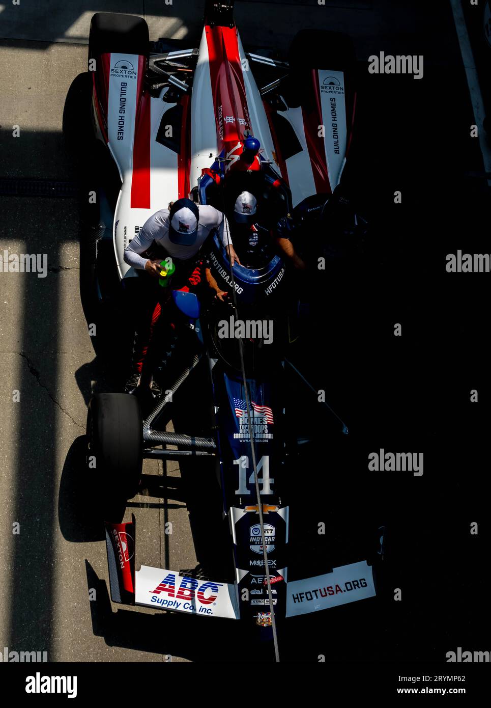 The AJ Foyt Racing Chevrolet crew roll out their race car to pit road ...