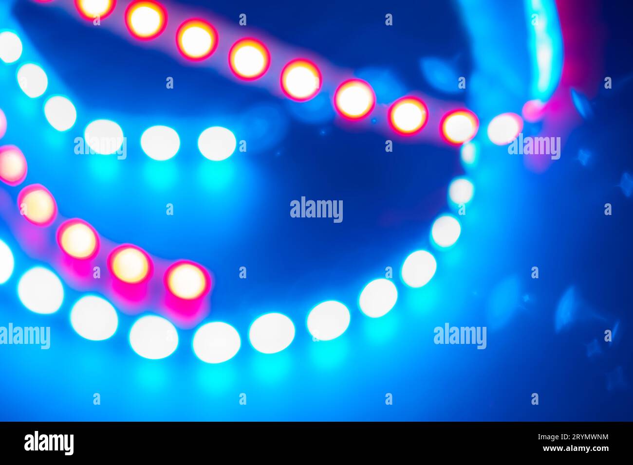 Pink blue neon garlands of bokeh lights and reflections. Festive ...