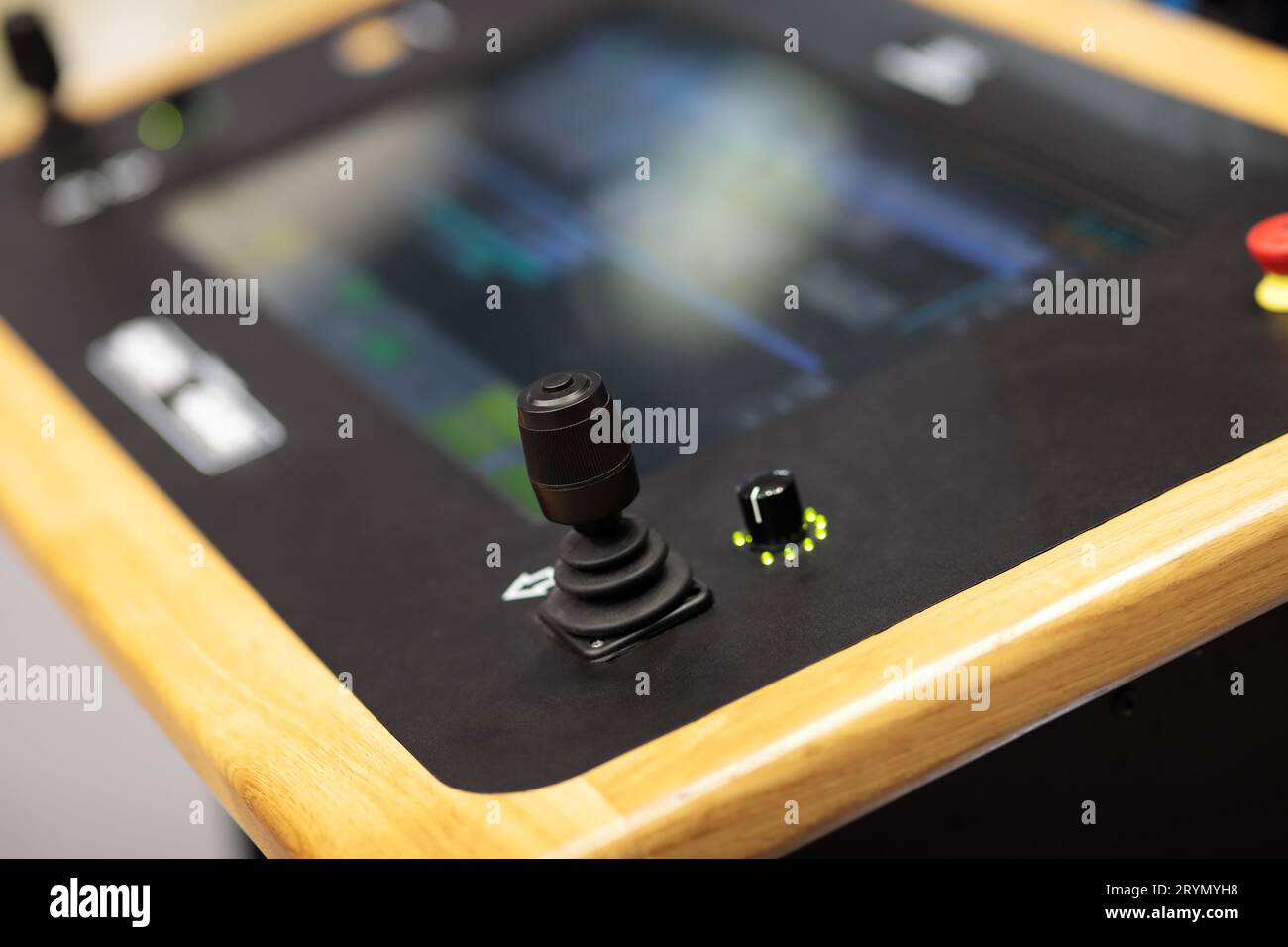 Modern control console with two joysticks and touchscreen. Selective ...