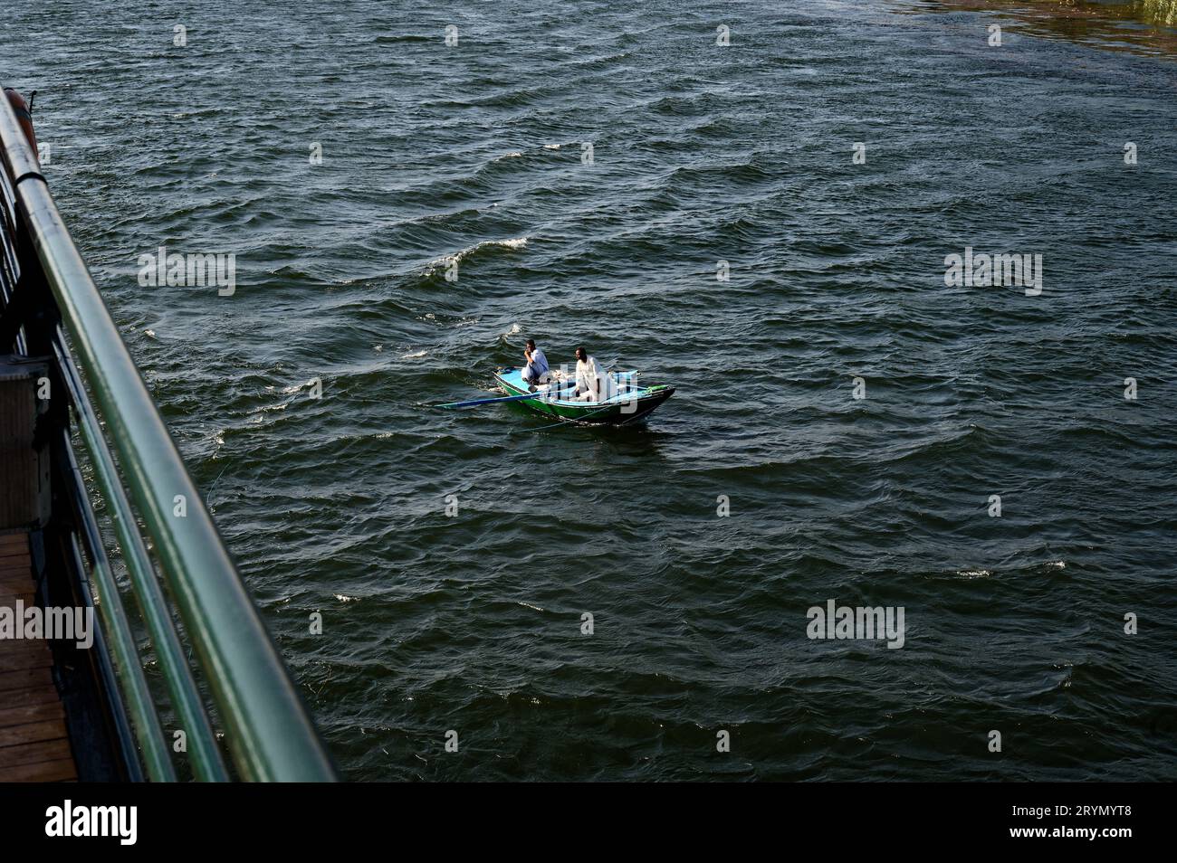 From the deck of a cruise. Local artisans eagerly approaching to show ...