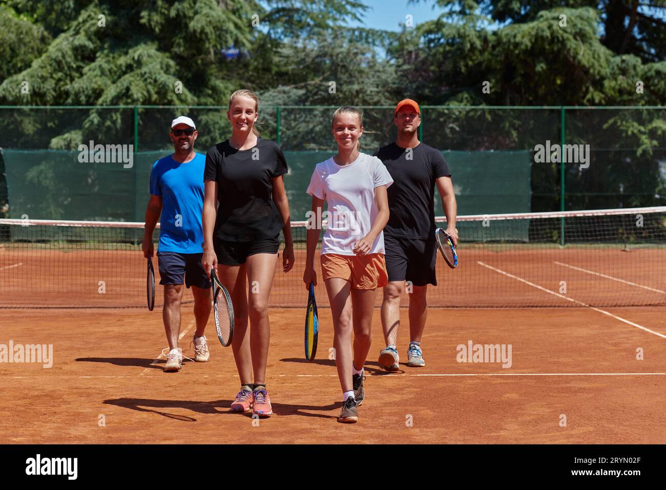 Tennis club together after hard training, showing their dedication ...