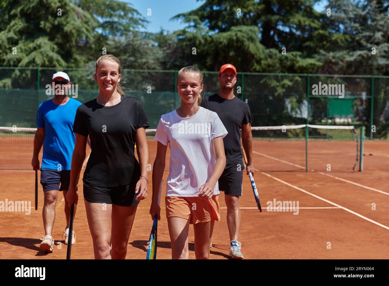 Tennis club together after hard training, showing their dedication ...
