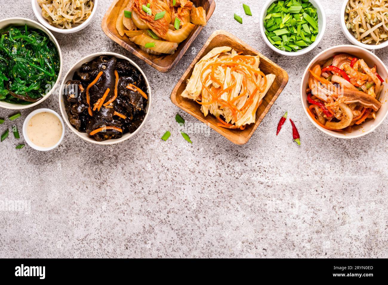 Asian food background. Korean spicy and vegetable pickled salads and ...