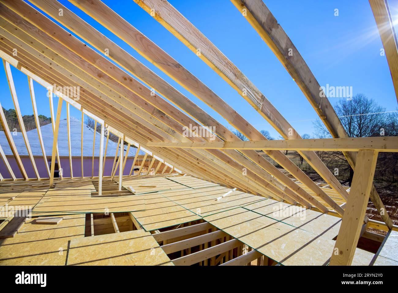 Wooden support beams for truss frame roofing of construction process in ...