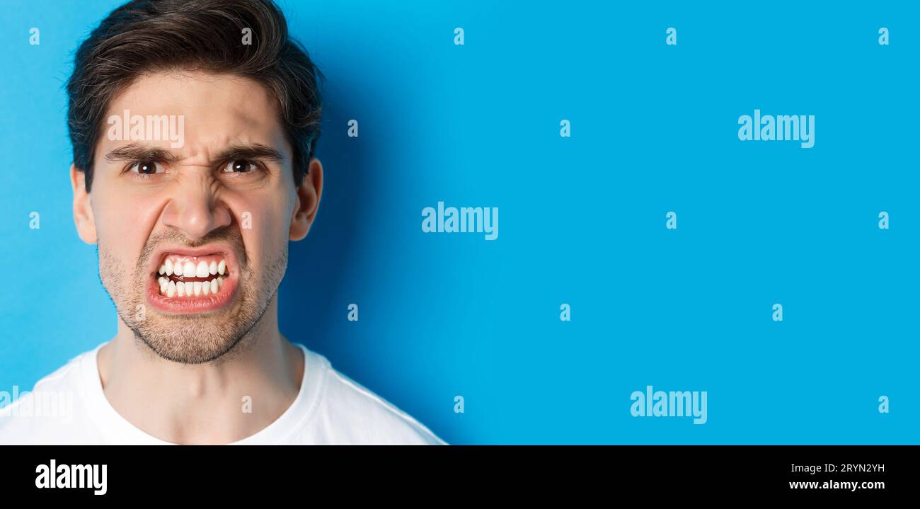 Headshot of angry caucasian man looking with scorn and dismay, being ...