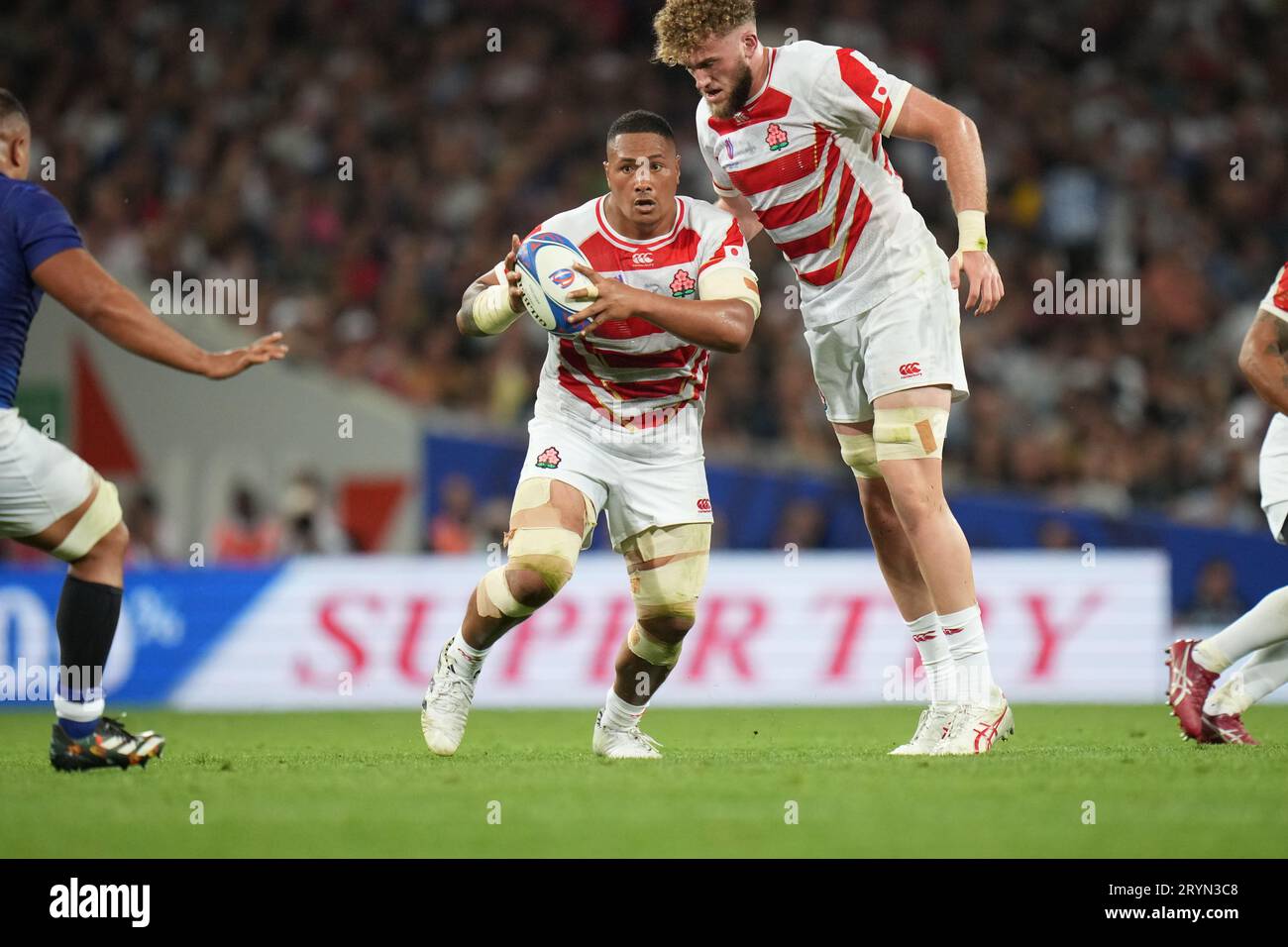 Japan's Asaeli Ai Valu (R) and Warner Dearns during the 2023 Rugby ...