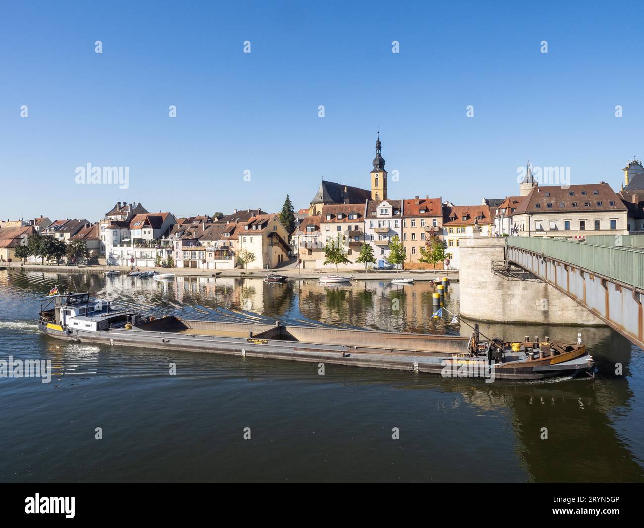 Cargo ship, view of townscape on the Main with St. Johannes Church and ...