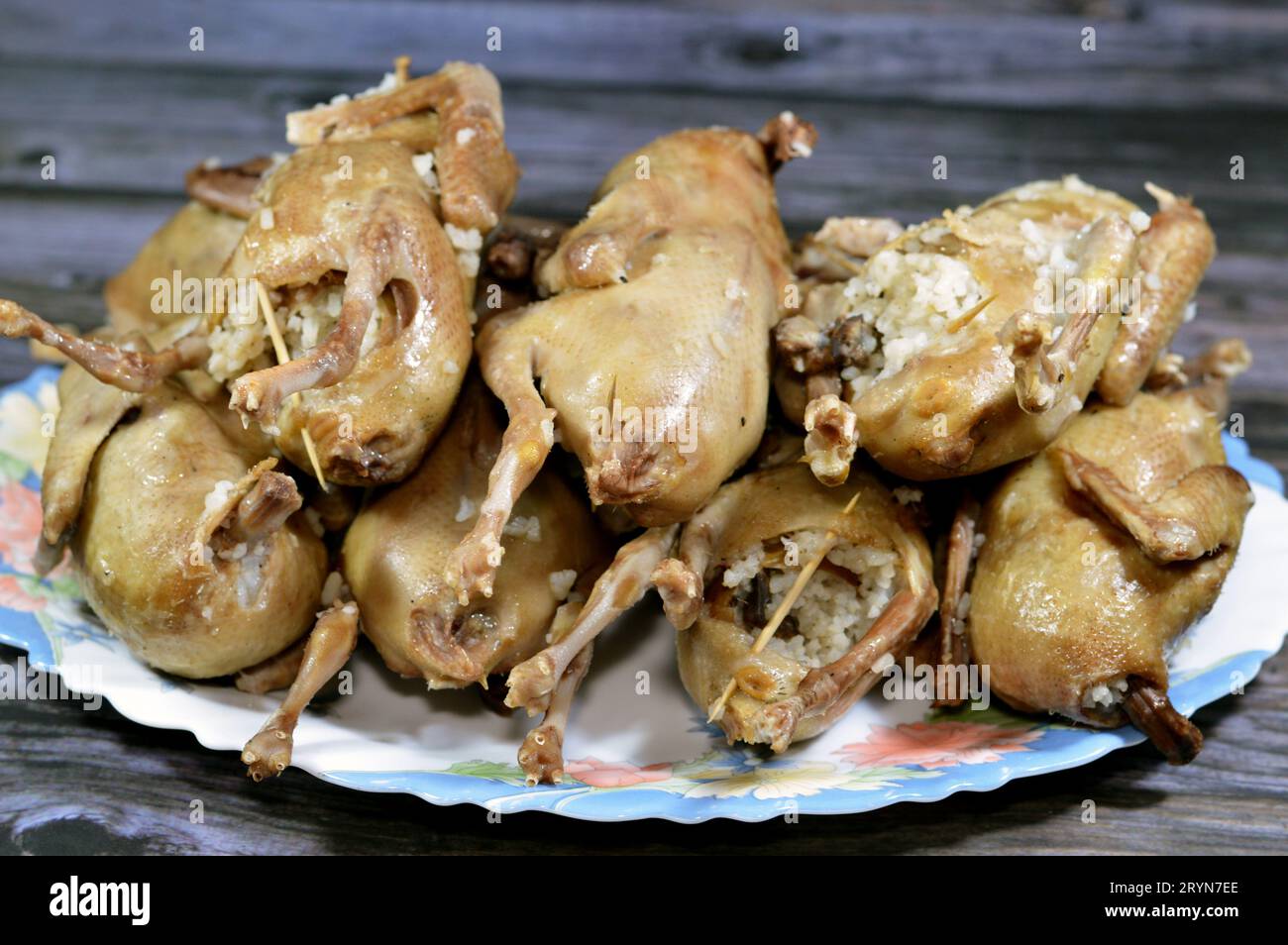 Boiled white rice stuffed pigeons or Hamam mahshi, boiled until cooked ...