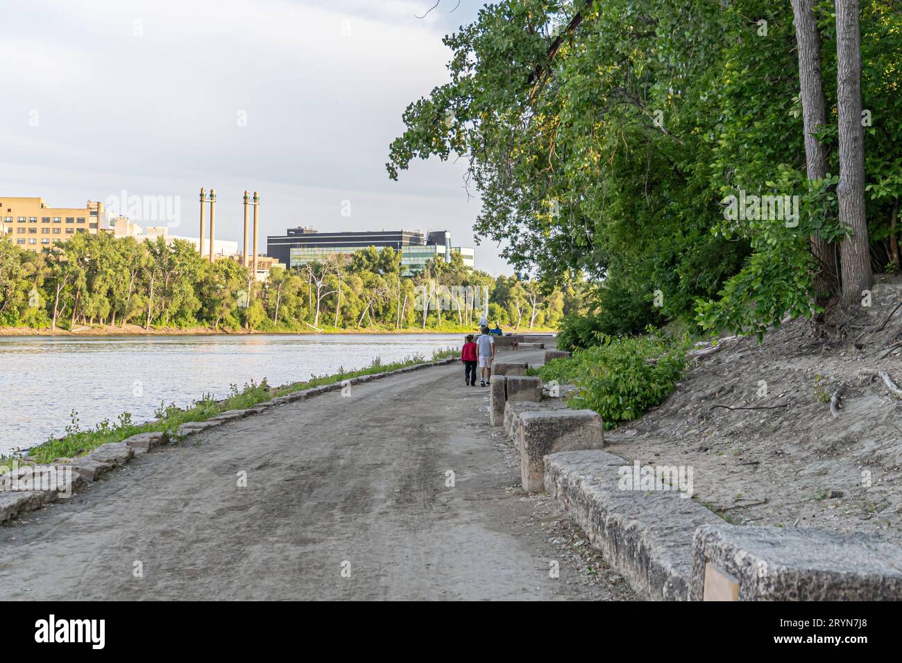 Woman walking beside a river hi-res stock photography and images - Alamy