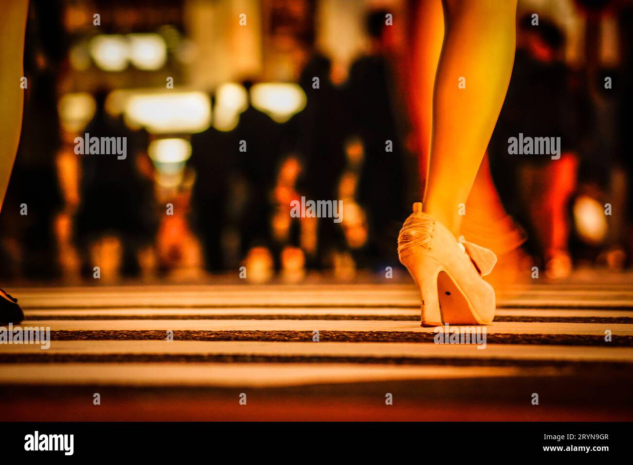 Feet of those who walk the Shibuya scramble intersection Stock Photo ...