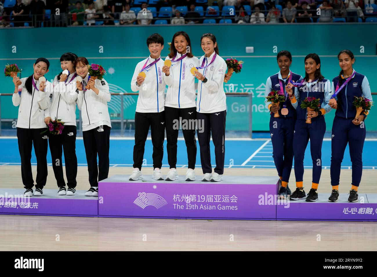 From left, silver medalists of South Korea, Seul Lee, Minjeong Park and ...