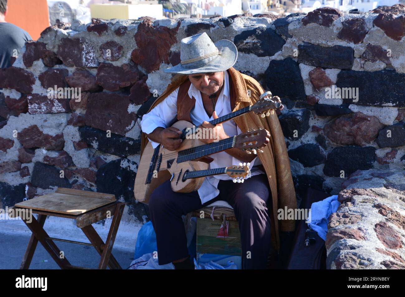 Old man playing three neck Guitar Stock Photo - Alamy