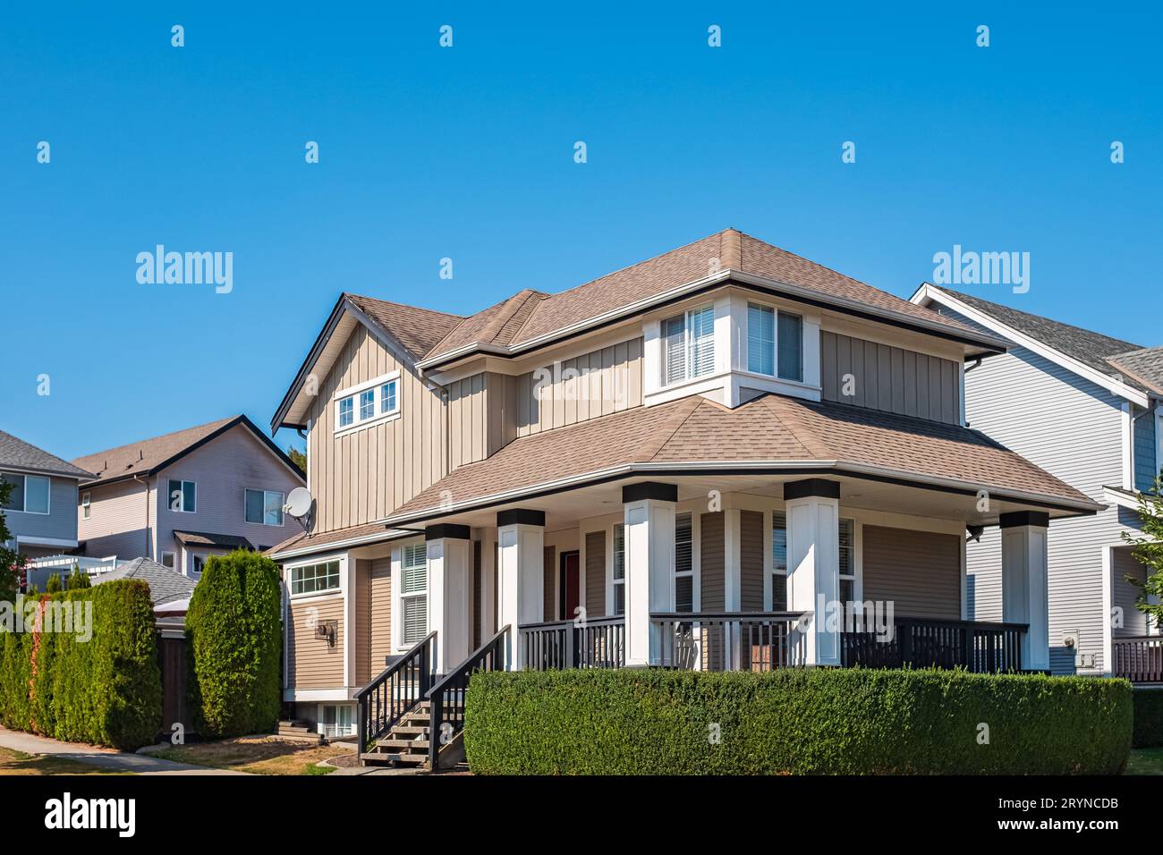 Real Estate Exterior Front House on a sunny day. Big custom made luxury ...