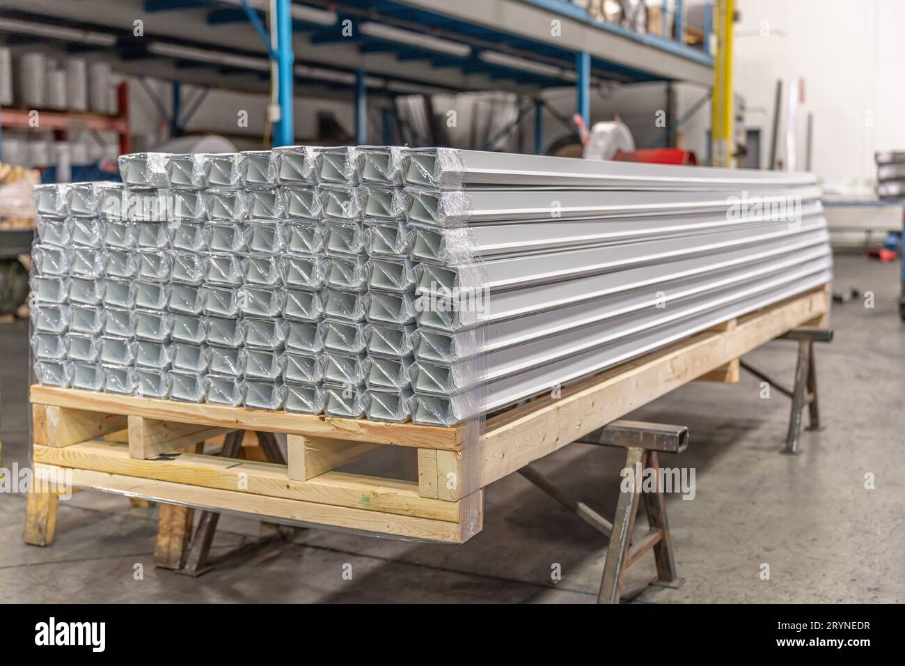 Metal flashing in metal roofing factory workshop Stock Photo - Alamy