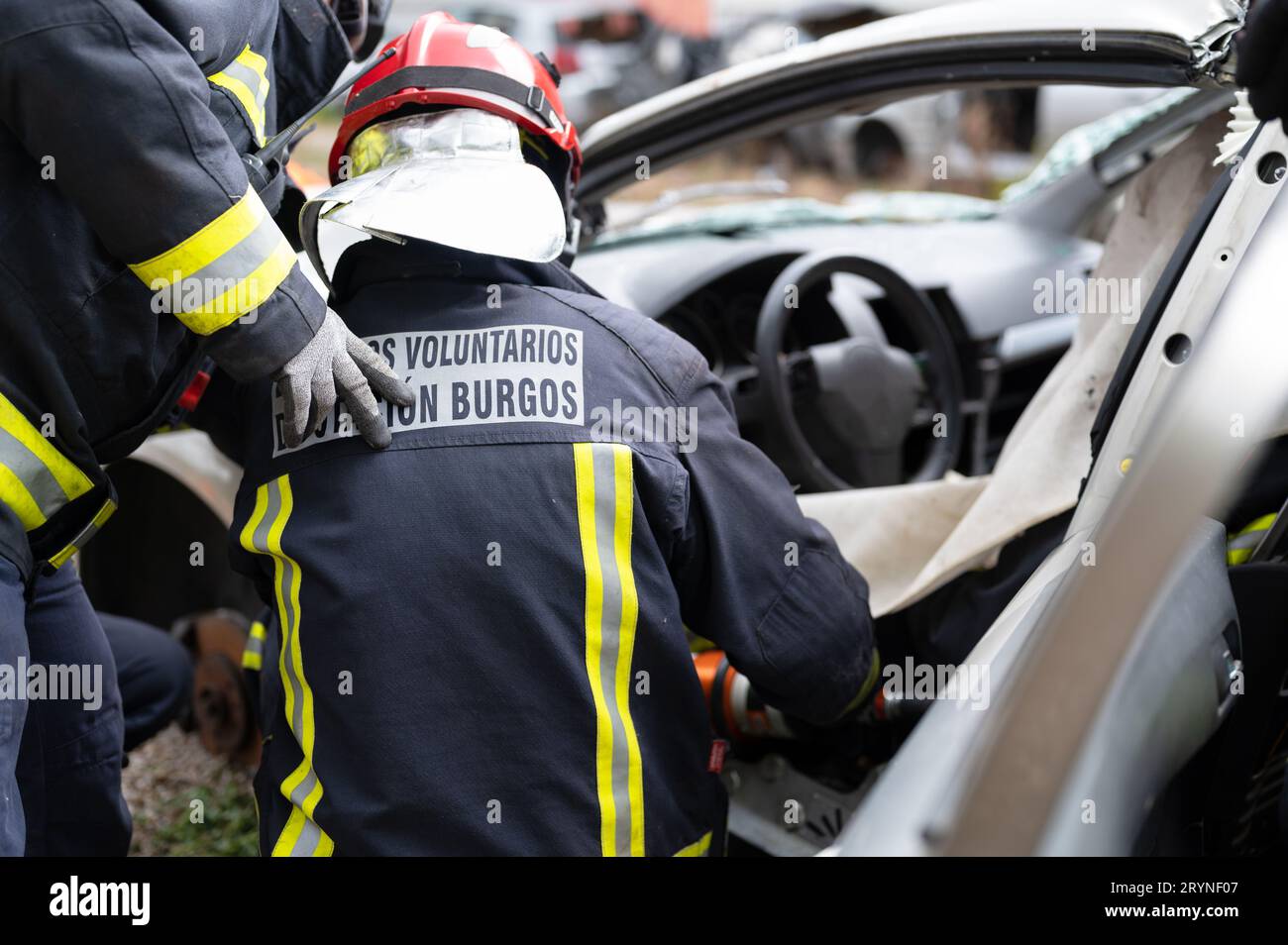 Car Crash Traffic Accident. Firefighters Rescue Injured Trapped Victims ...