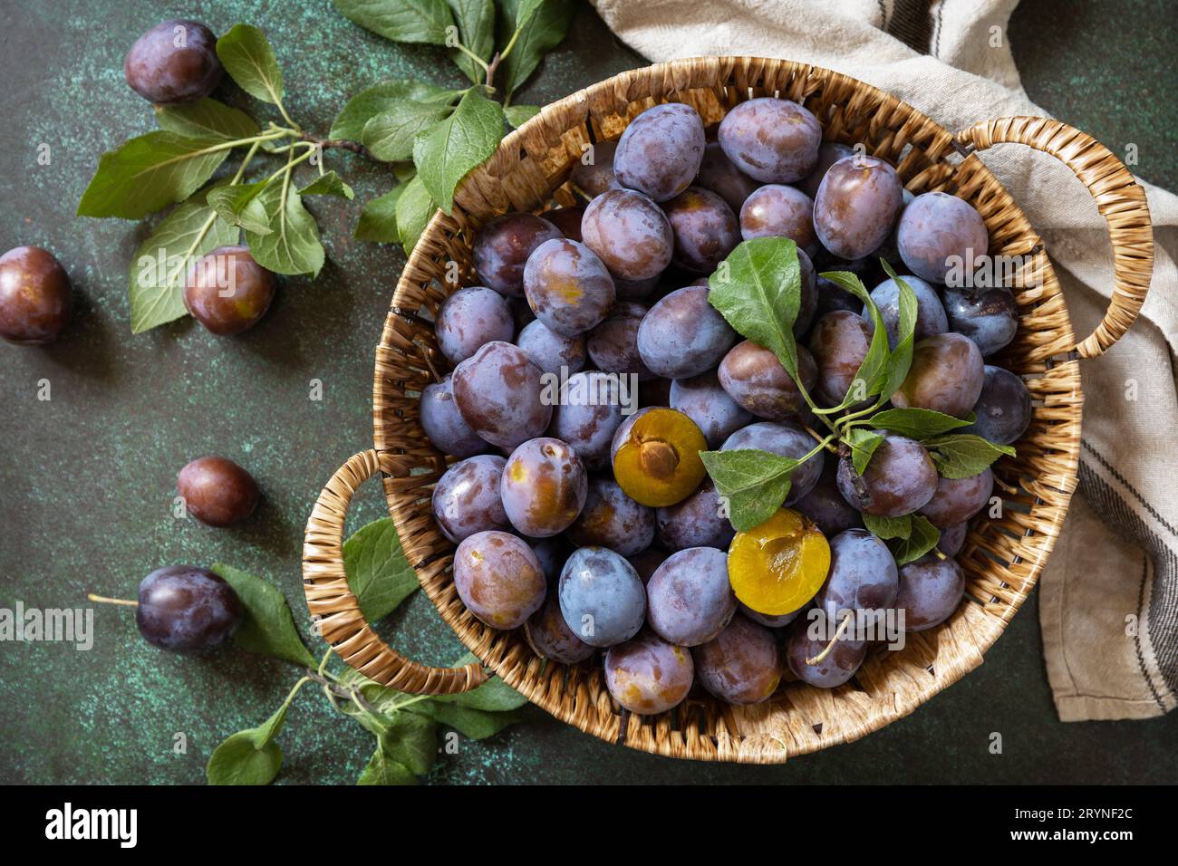 Fruit background, organic fruits. Still life food. Basket of fresh blue ...