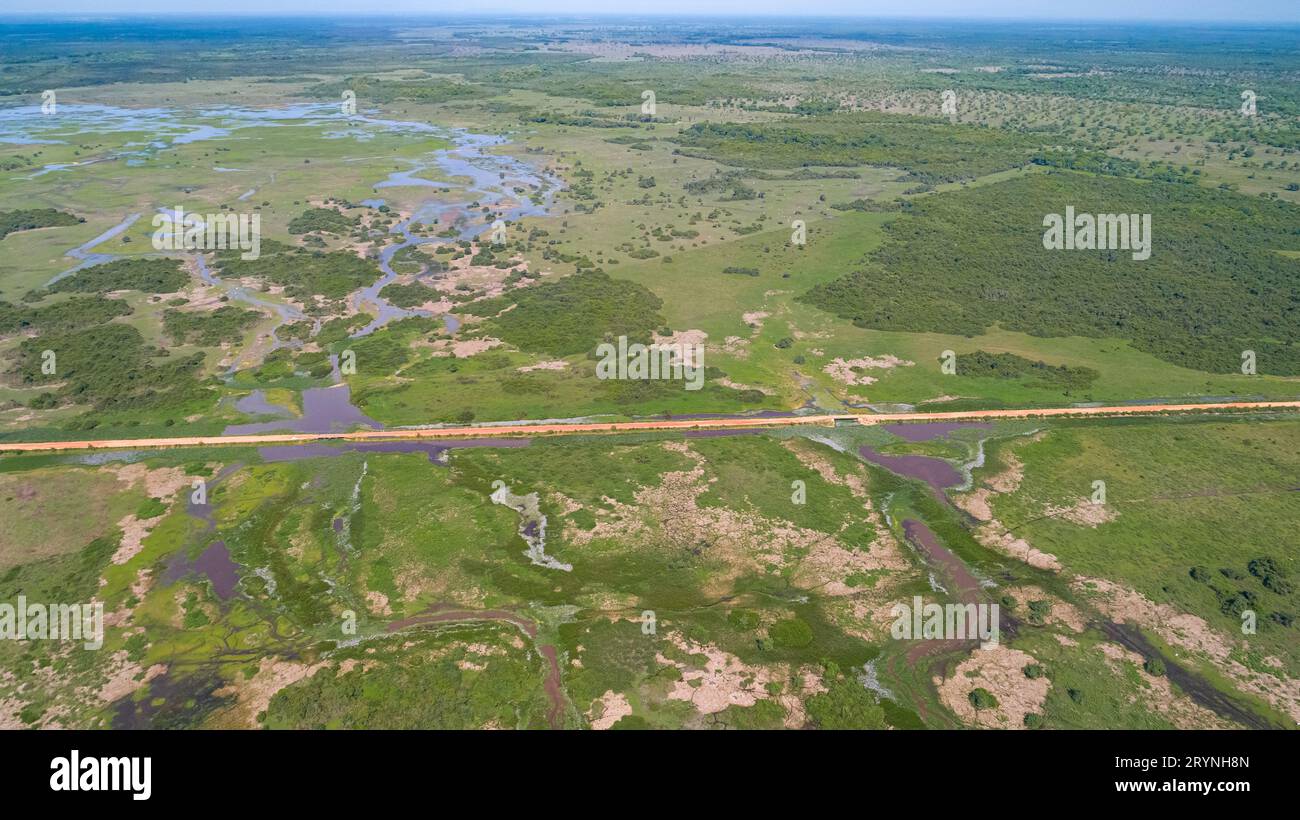 Aerial view of Transpantaneira dirt road crossing in typical Pantanal ...